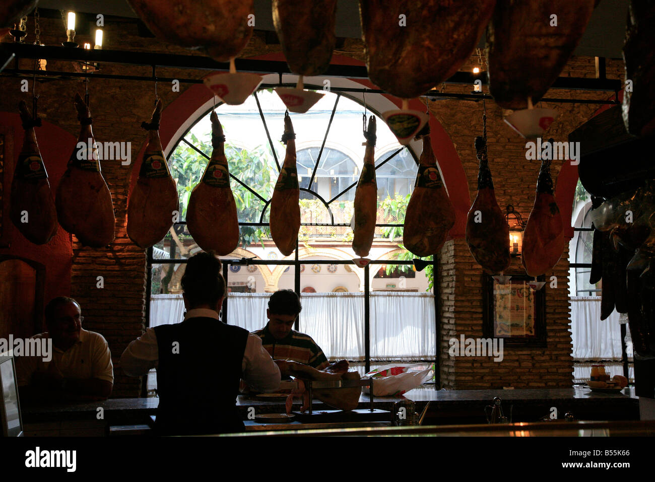 Dried ham hanging hi-res stock photography and images - Alamy