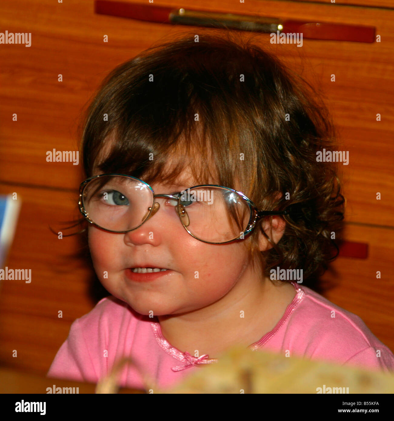 small child with adult spectacles Stock Photo - Alamy