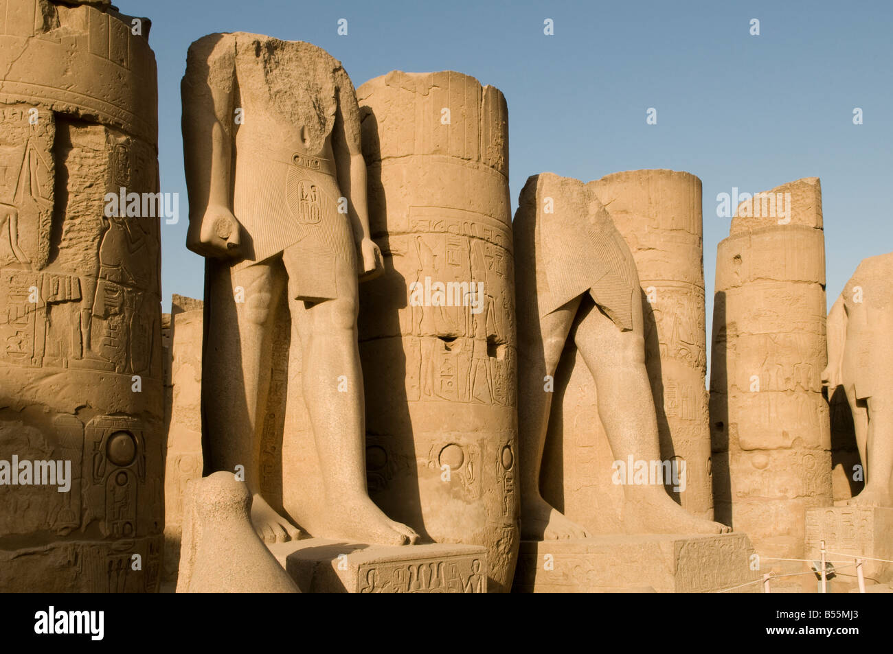 Sculpted columns at the Court of Ramses II at Luxor Temple of Thebes ...