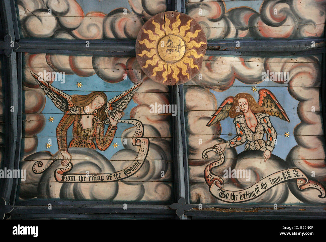 Jacobean painted ceiling showing clouds angels and the sun in St Peter ...