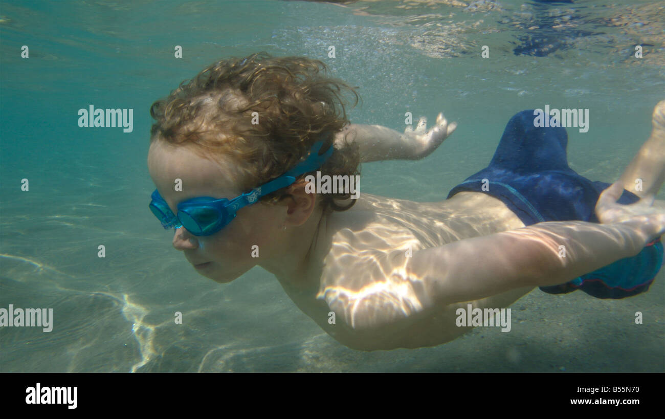 Boy hold breath underwater hi-res stock photography and images - Alamy