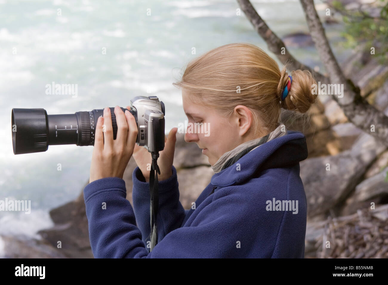 Young photographer with telephoto lens Fraser River Rearguard Falls ...