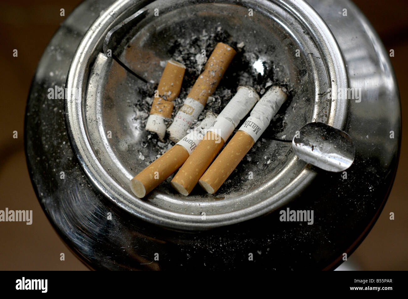 Cigarette in a ashtray Stock Photo - Alamy
