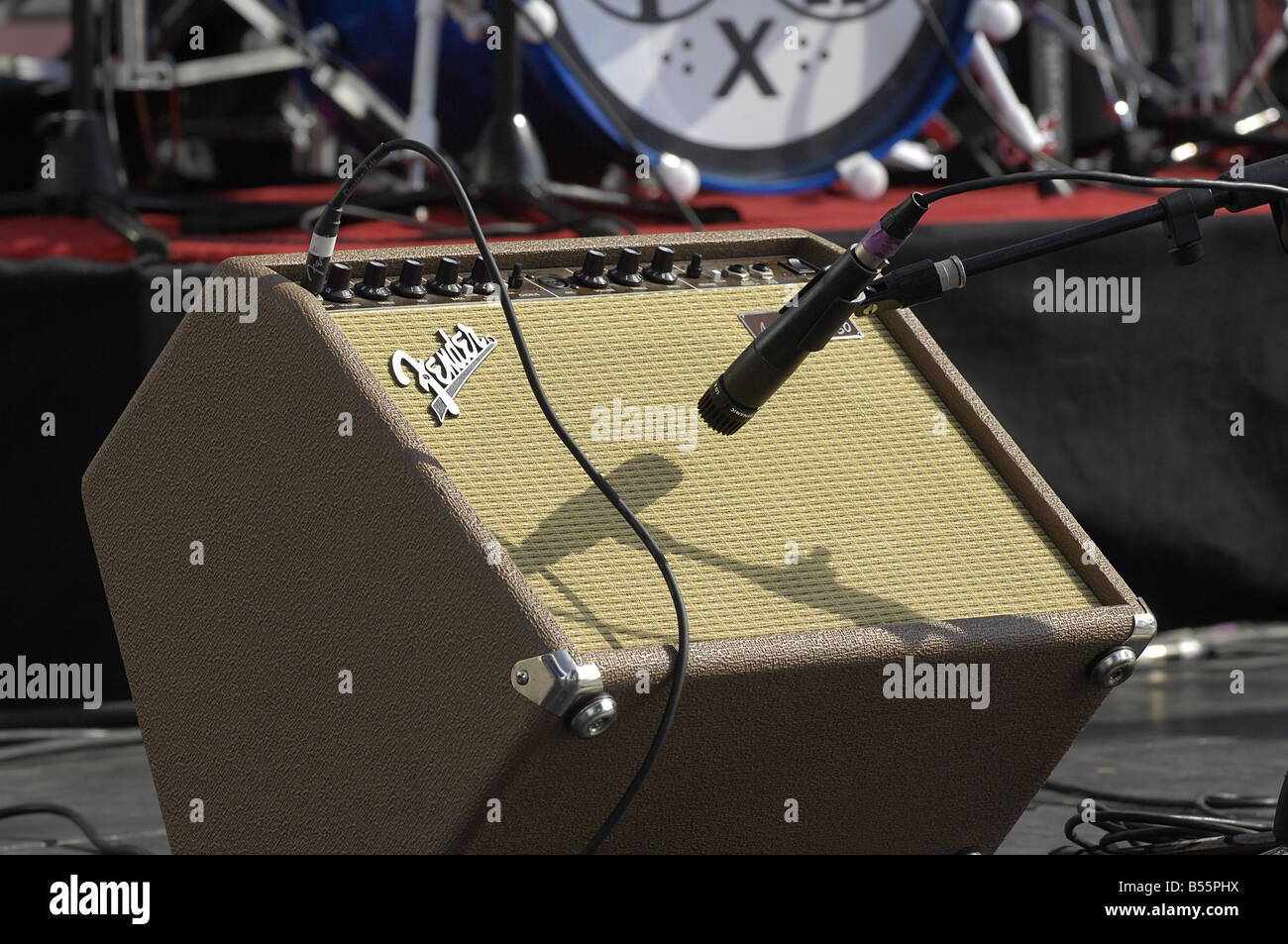 A Fender amplifier is set up on stage prior to a concert performance ...