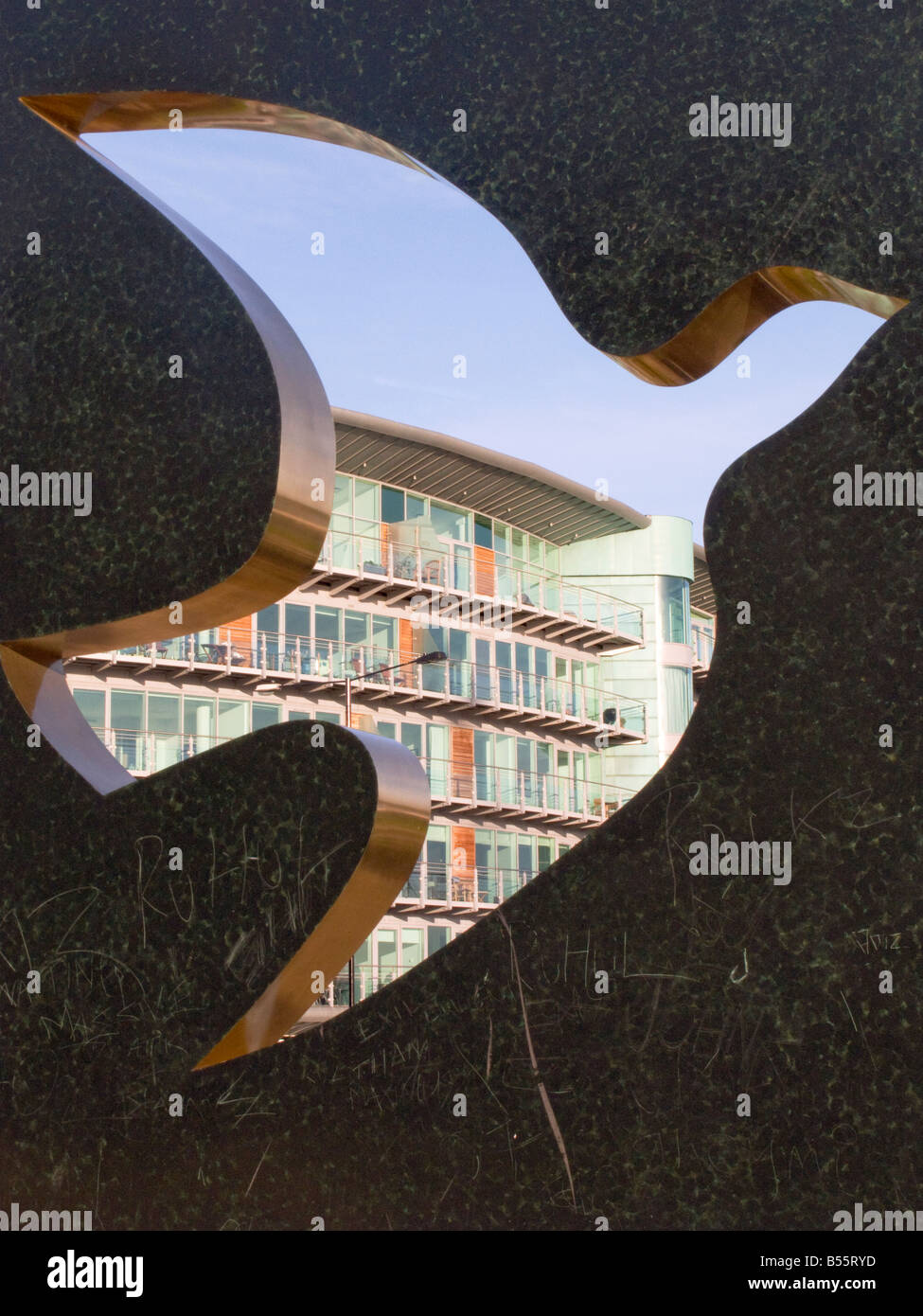 Dove of peace statue by luxury flats by Thames near St Katherines Dock ...