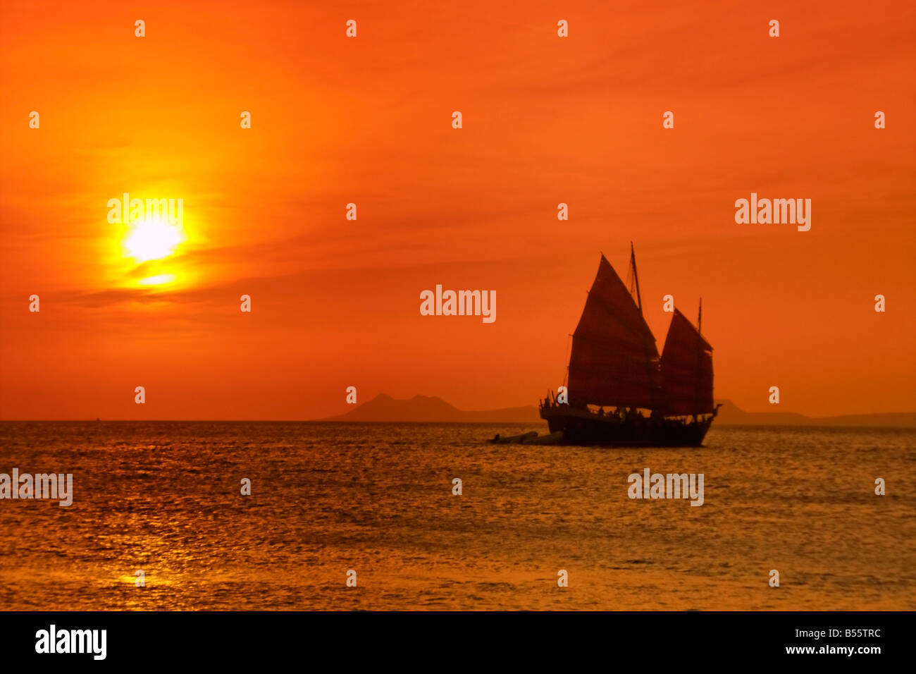 West Indies Bonaire sunset sailing boat sunset Stock Photo - Alamy
