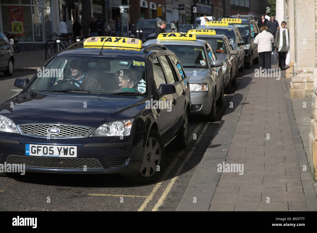 Line of taxis Bury St Edmunds Suffolk England Stock Photo - Alamy