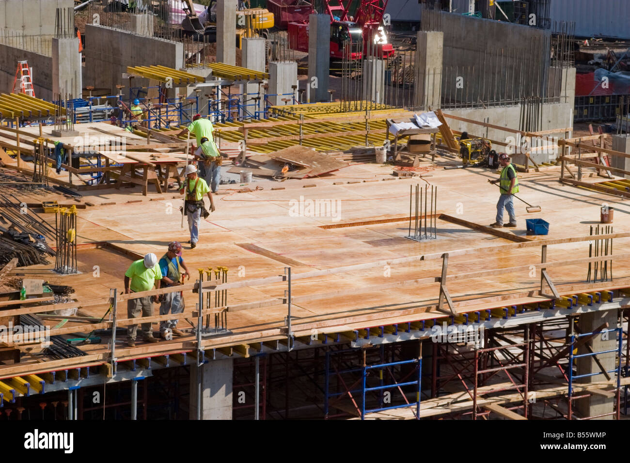 Workers at a construction site Stock Photo - Alamy