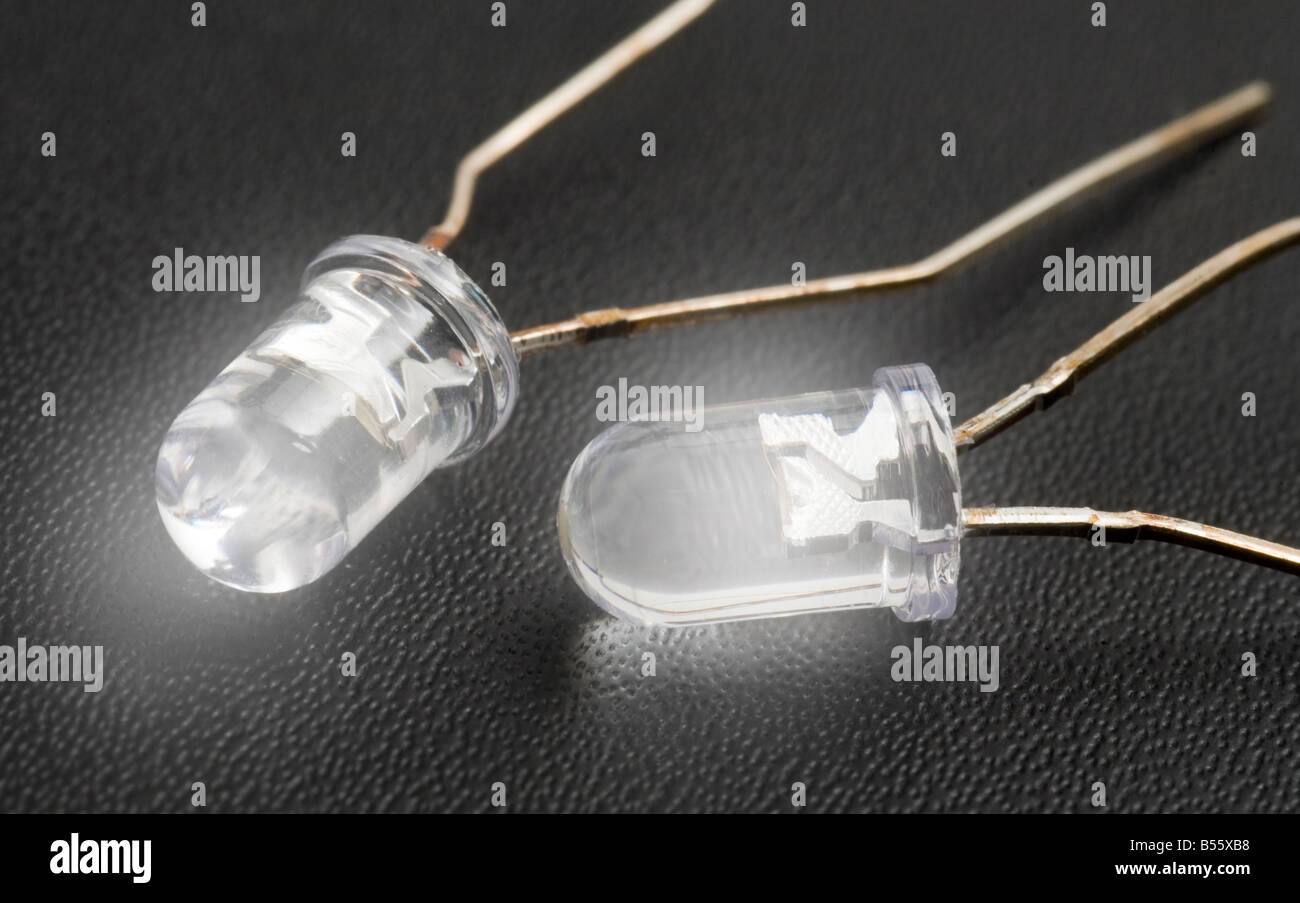 Two white LED lamps dark background Stock Photo - Alamy
