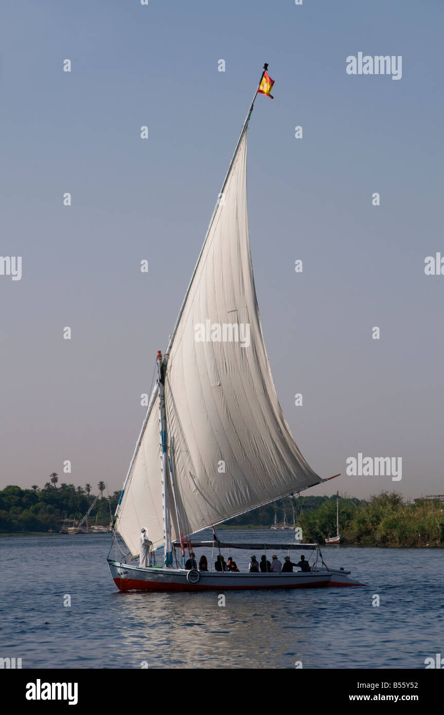Traditional felucca boat sailing on the Nile river in Aswan Egypt Stock ...