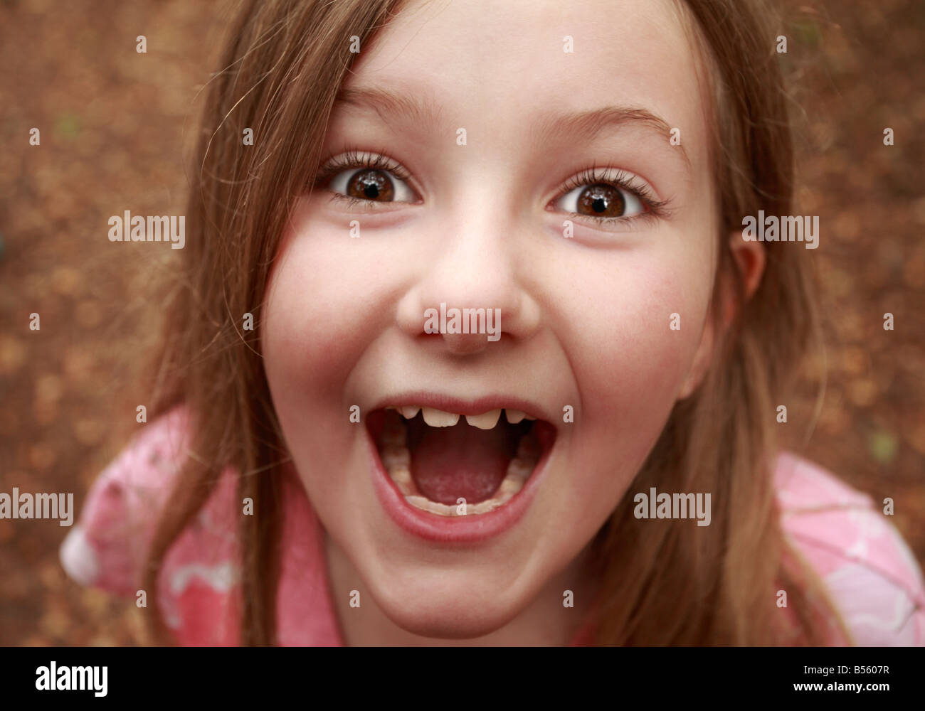 The face of an excited nine year old girl. "Available in black and ...