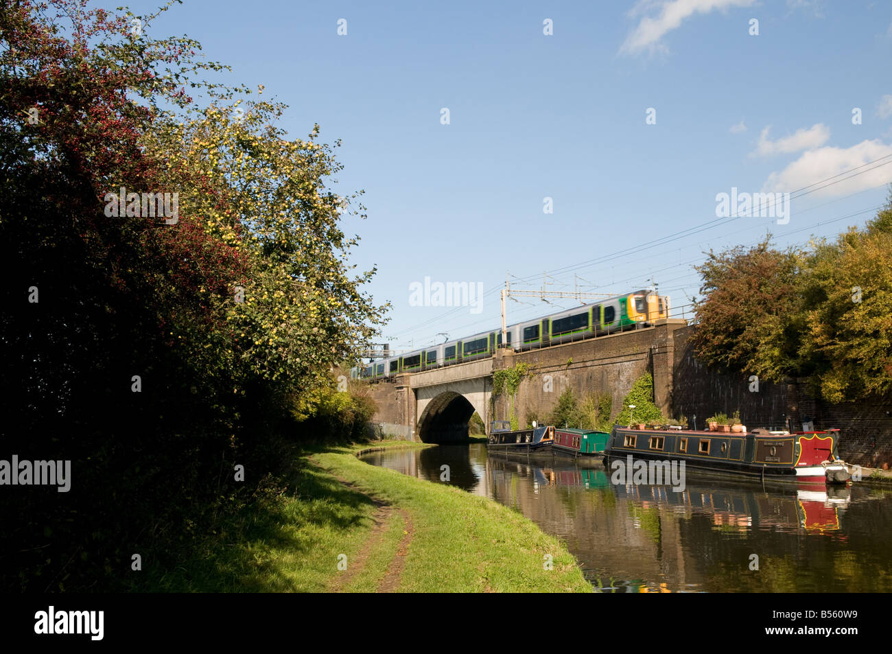 Intercity train flies over a canal bridge Stock Photo - Alamy
