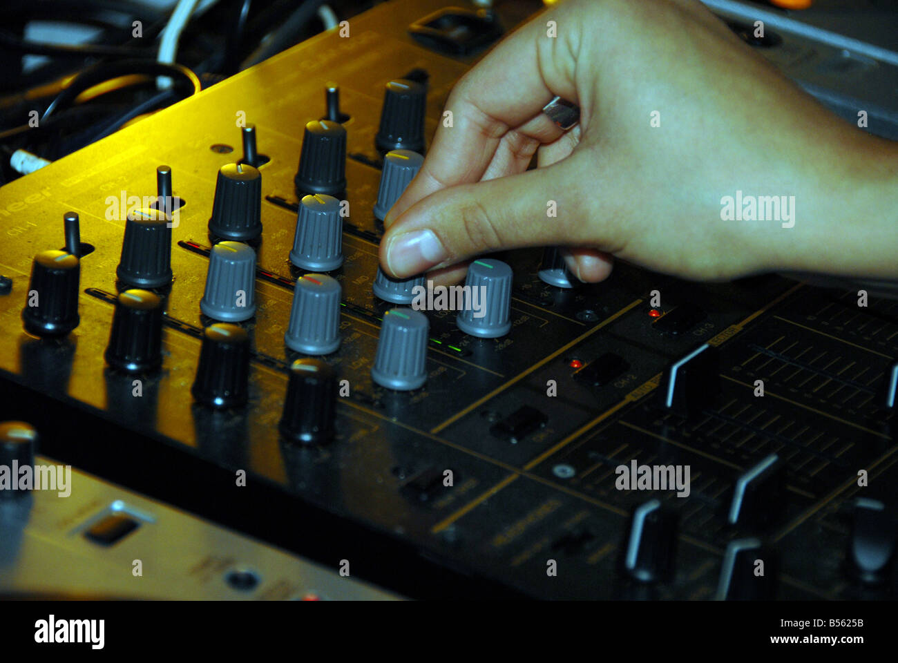 mixing desk with a hand Stock Photo - Alamy