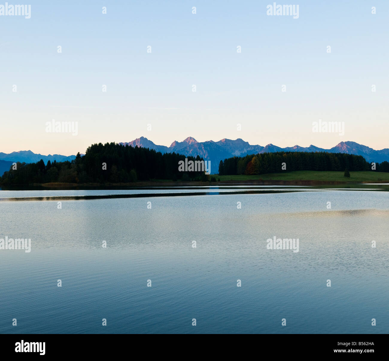 Illasbergsee and Forggensee lake at dawn with Allgäu Alps mountains ...