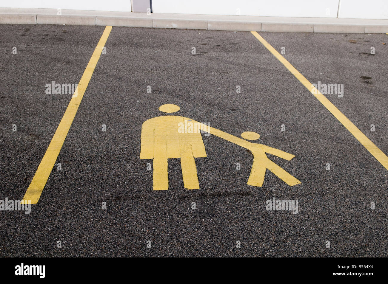 Mother and Child bay in a Car Park Stock Photo - Alamy
