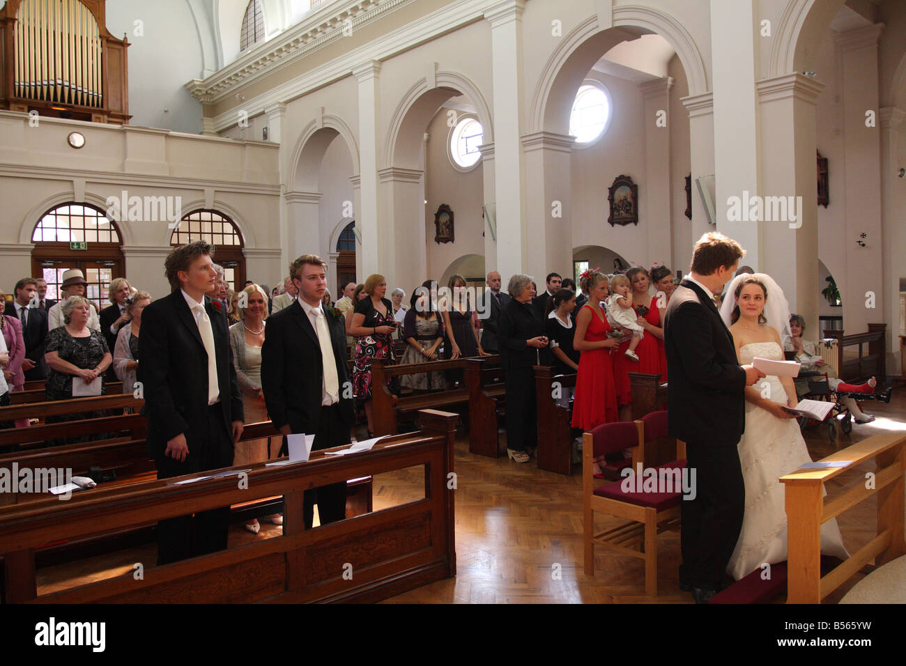Church wedding ceremony congregation hi-res stock photography and ...