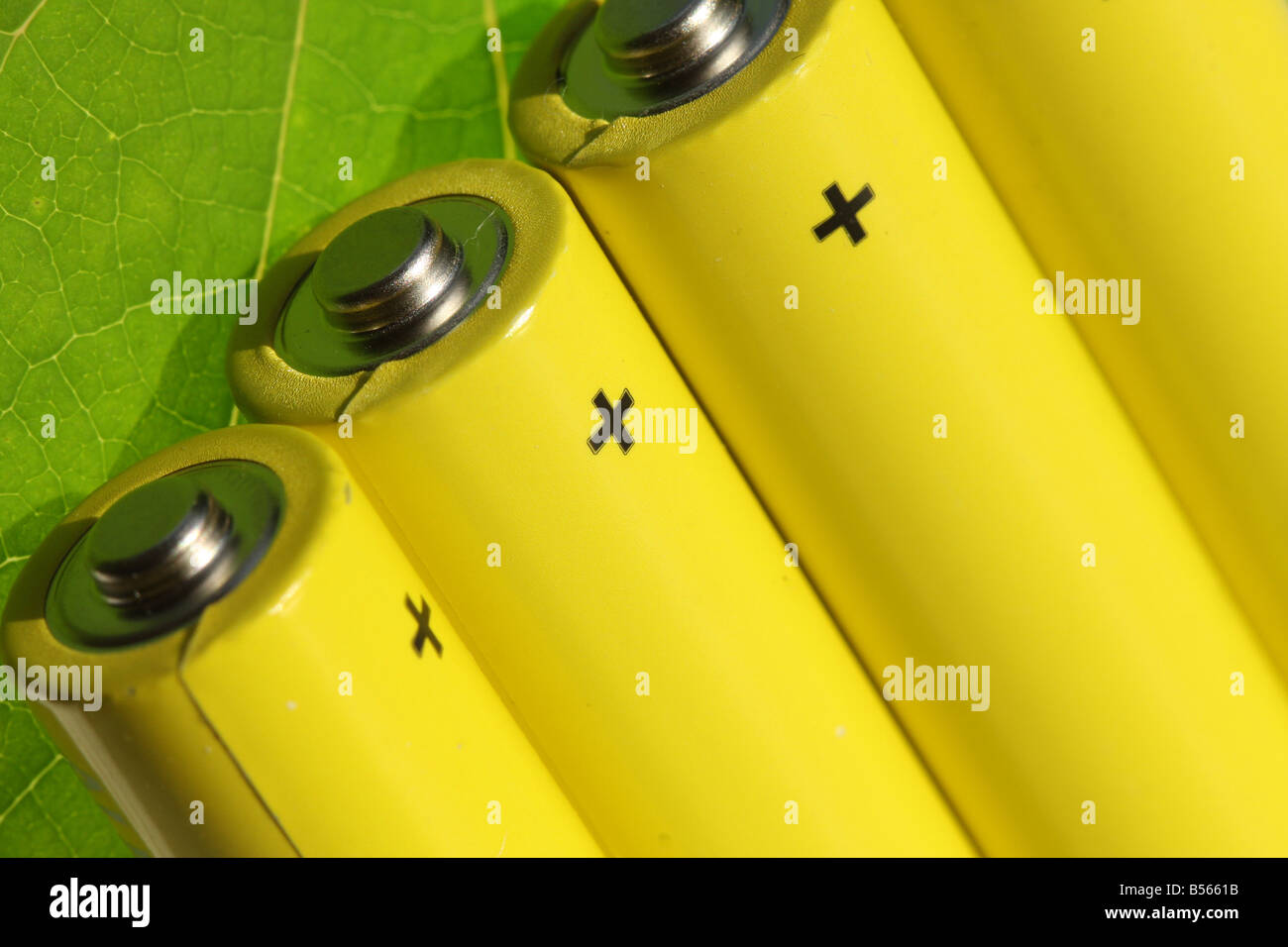 Green and yellow batteries, illustrates the concept of green ...