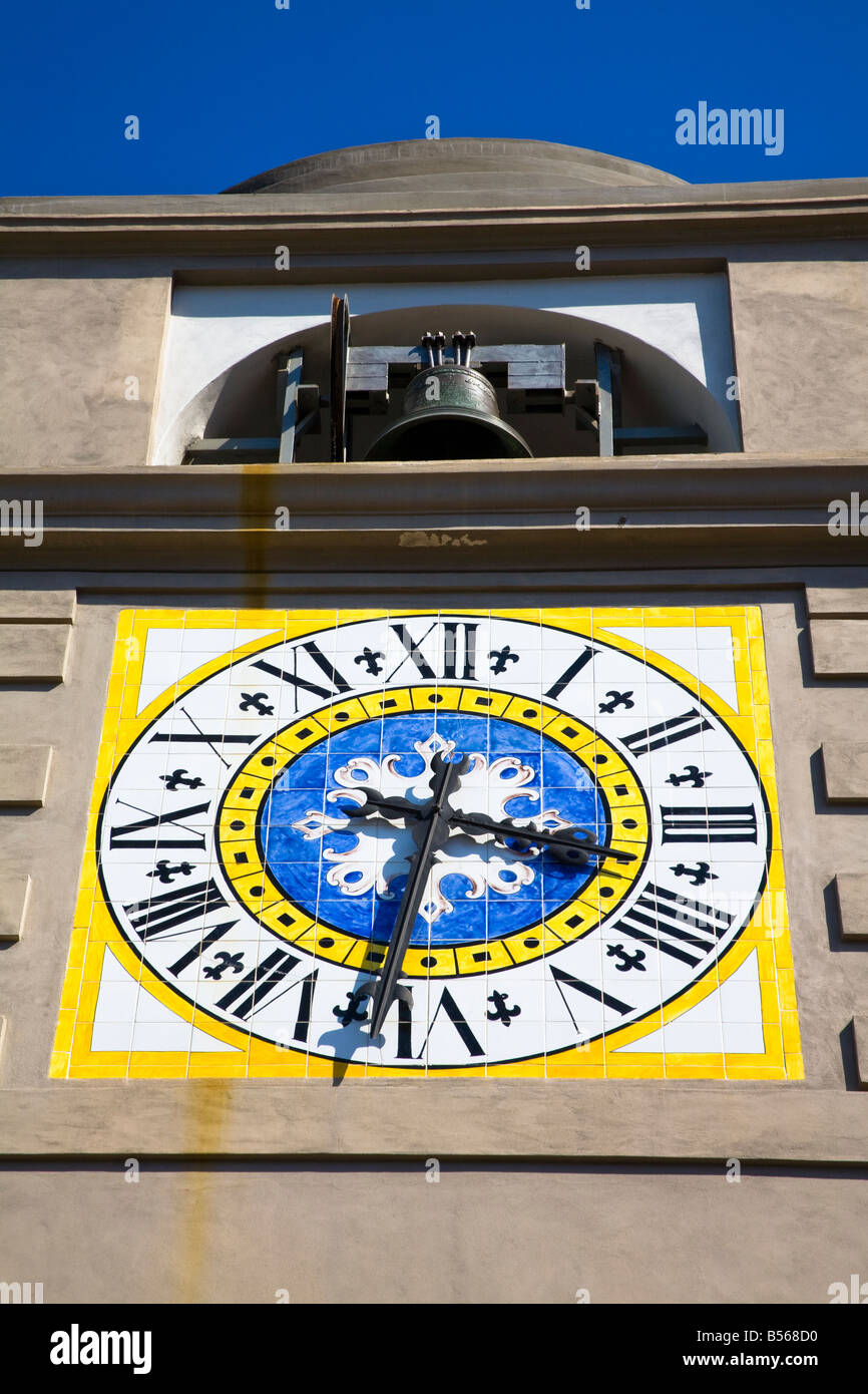 Colourful tiled clock on clock tower, Piazza Umberto, Capri, Italy ...