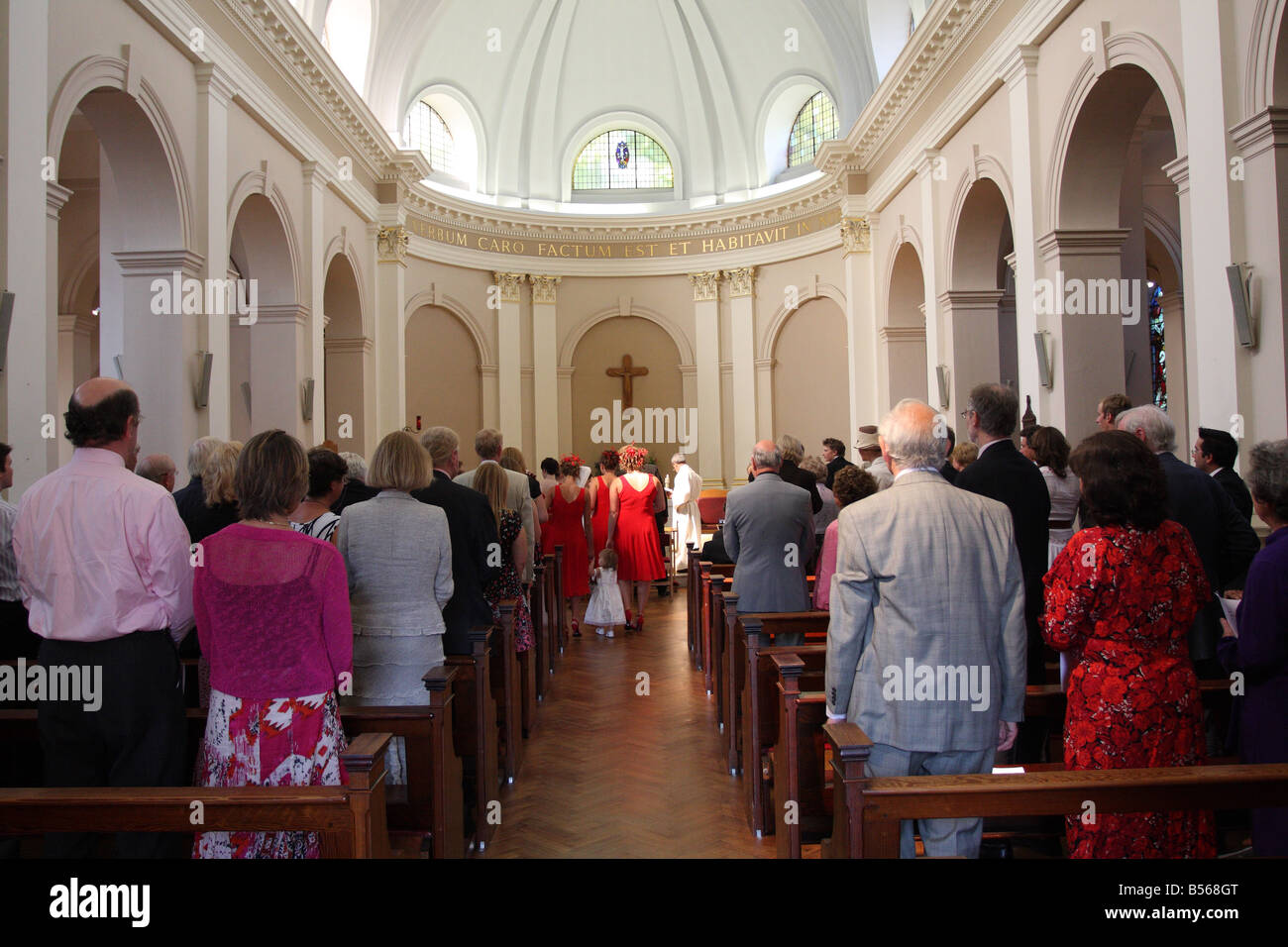 Congregation at church wedding Stock Photo - Alamy