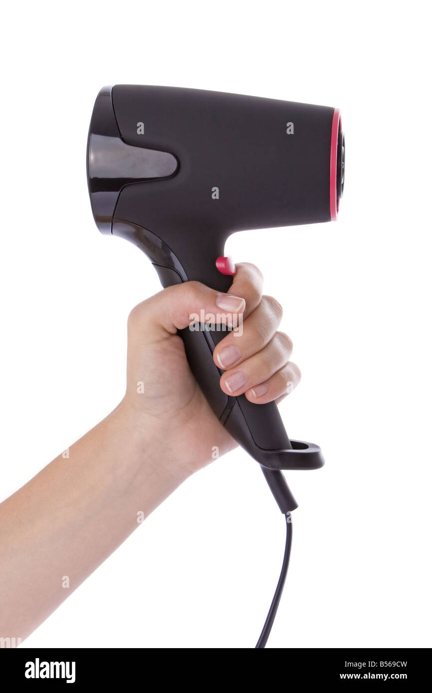 Hand holding a hairdryer isolated on white background. cut out cutout ...
