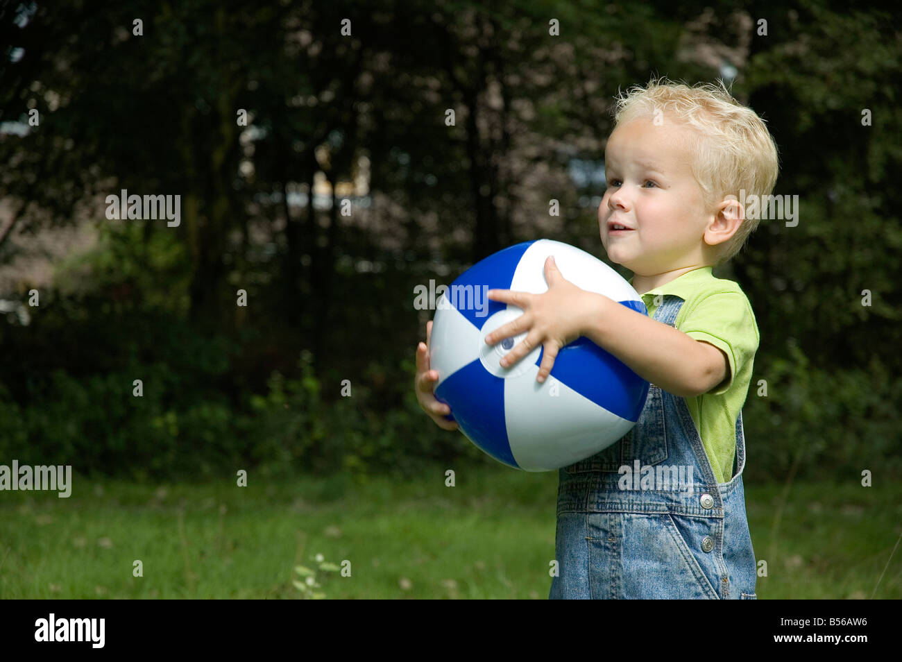 Little boy has caught the ball Stock Photo - Alamy