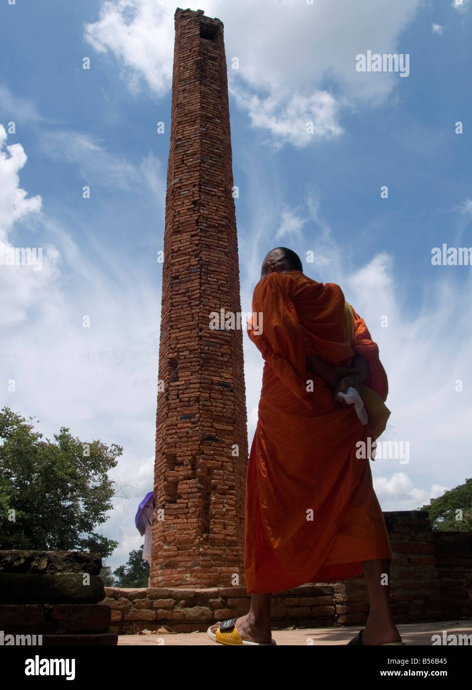monk walking at Phra Mahathat temple in Ayutthaya Thailand Stock Photo ...