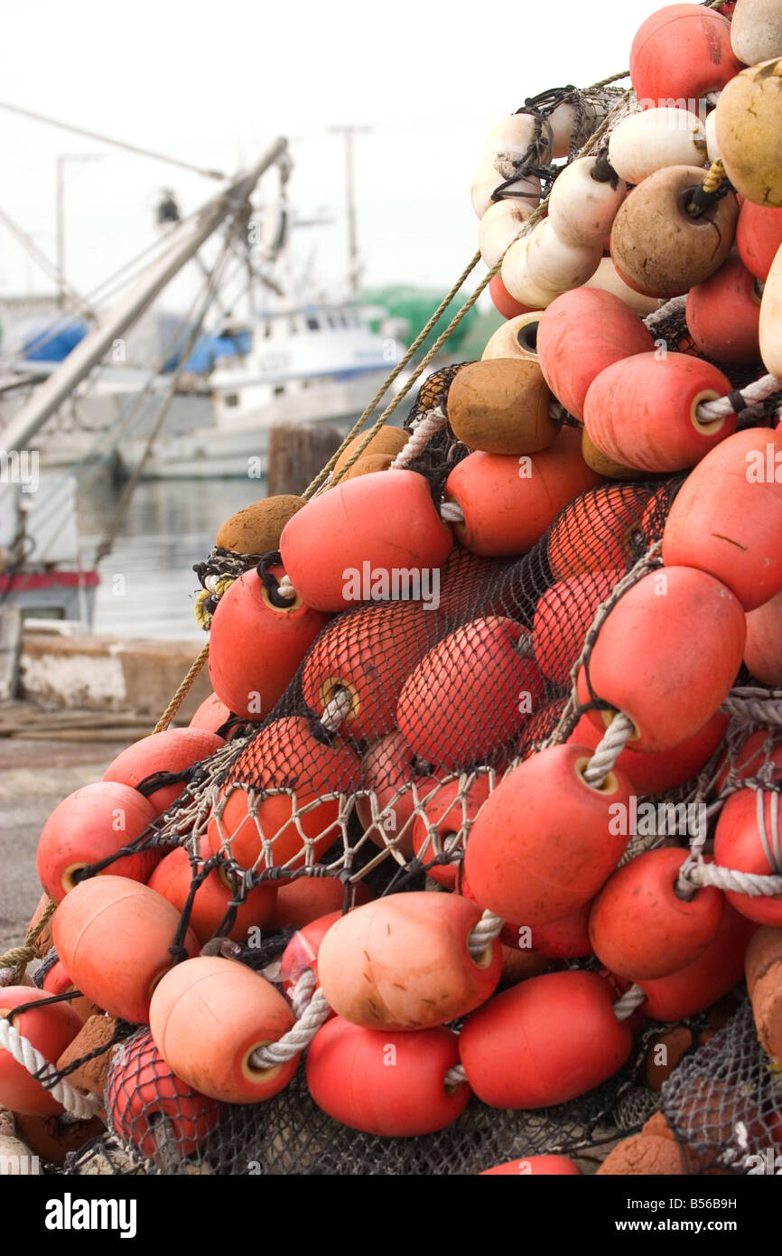 Orange fishing floats Stock Photo - Alamy
