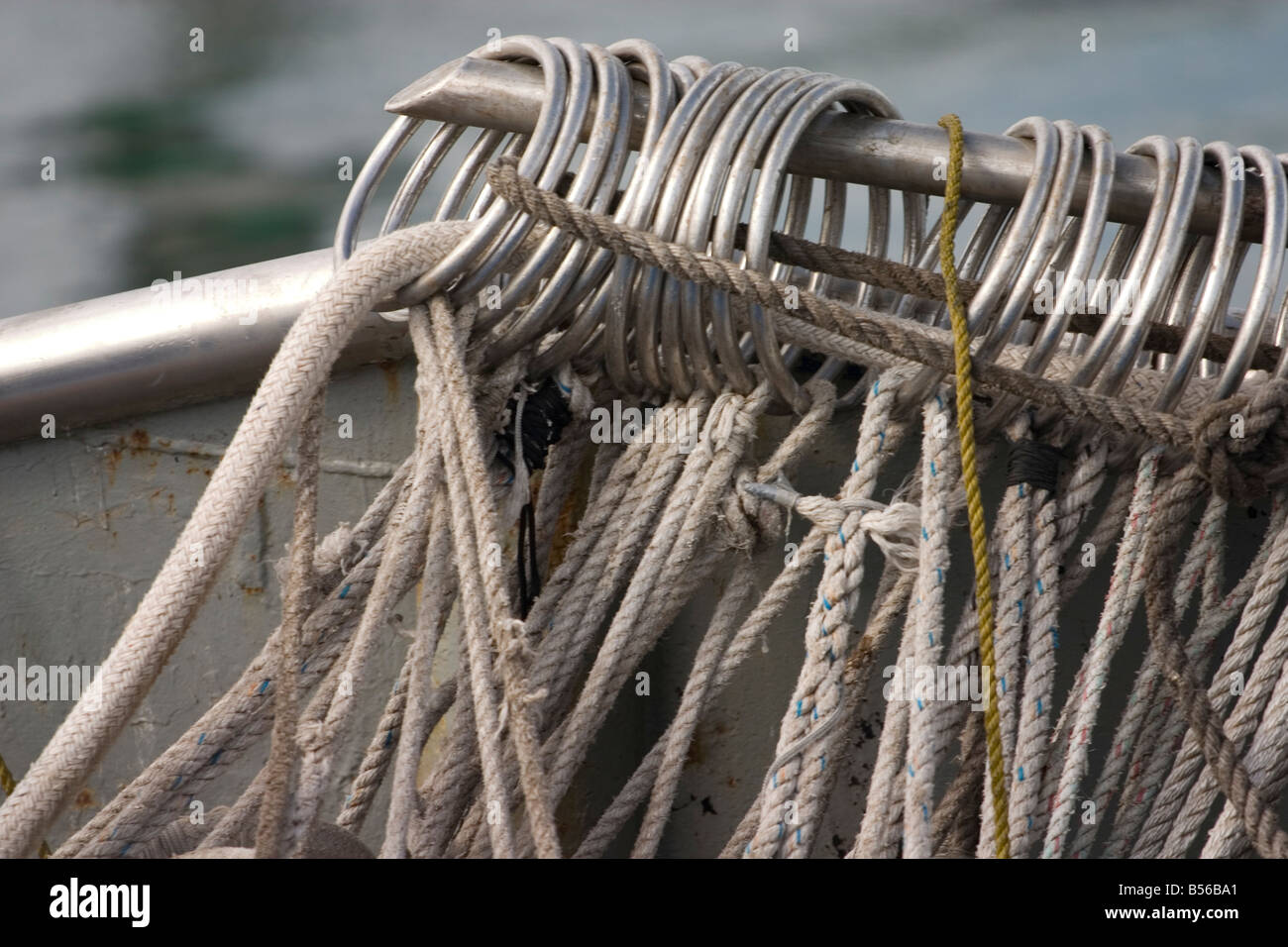Fishing lines neatly arranged on a metal rod Stock Photo - Alamy
