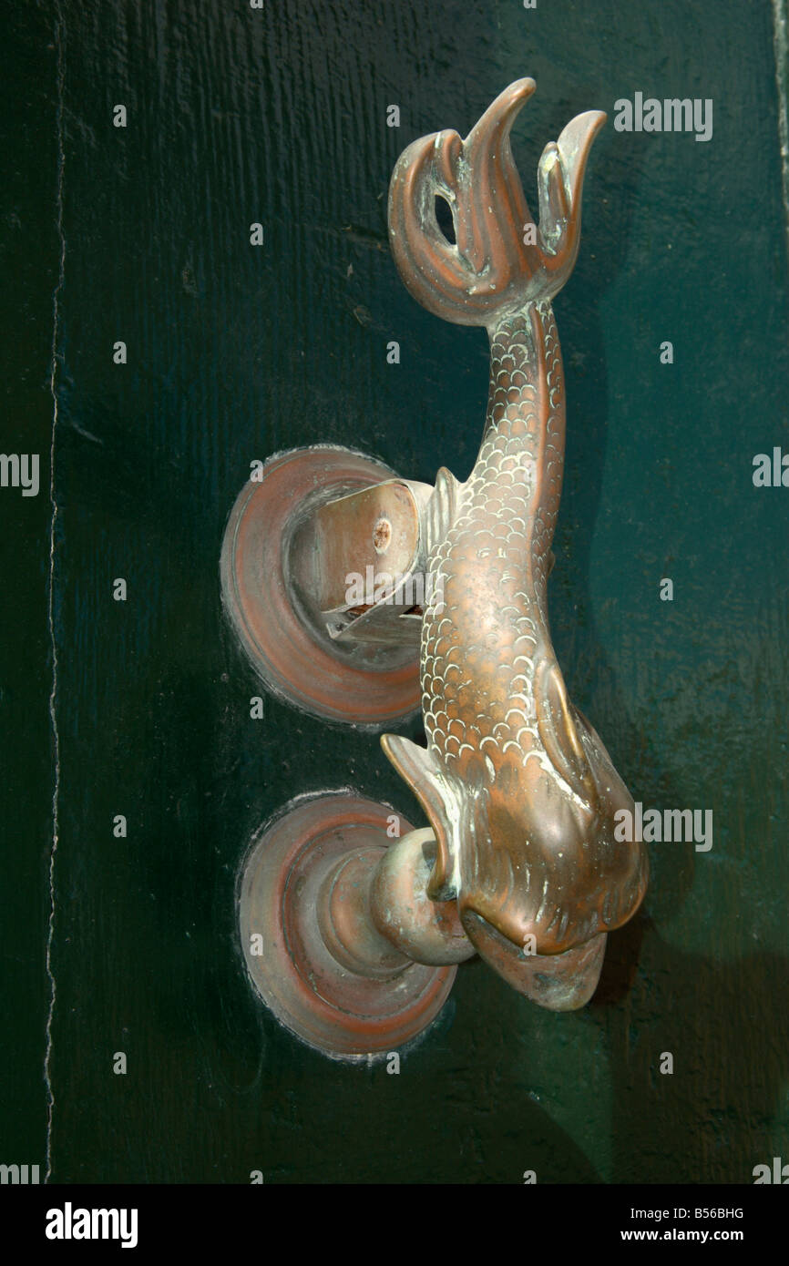 Brass fish shaped door knocker hi-res stock photography and images - Alamy