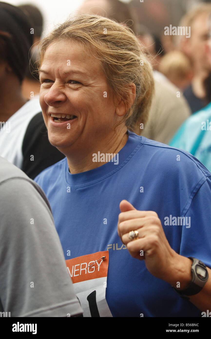 Runners edf half marathon mature woman athlete smiling laughing 40s hi ...