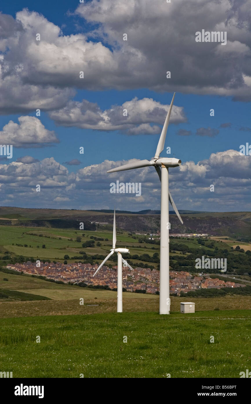 Taff Ely Wind Farm on hillside above housing estate near Tonyrefail ...