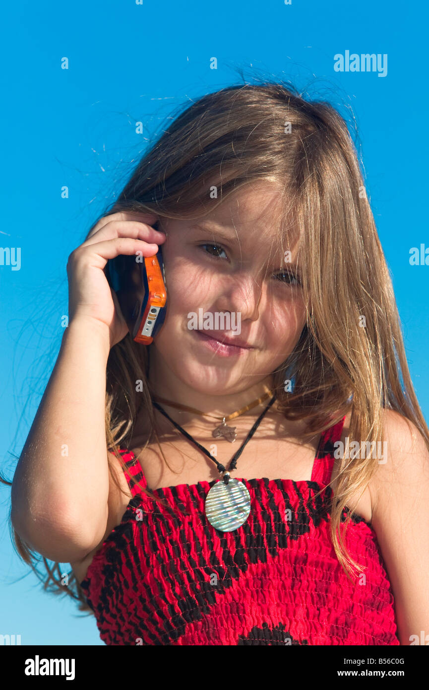 CHILD WITH PHONE Stock Photo - Alamy