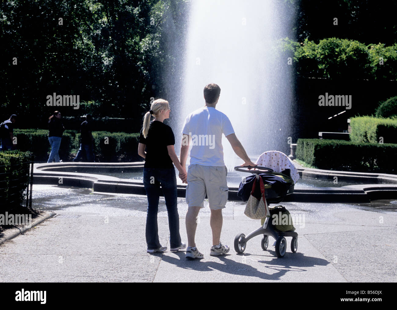 Couple and pushing pram and park hi-res stock photography and images ...