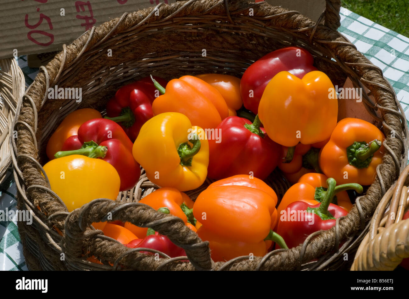 Basket full of peppers Stock Photo - Alamy