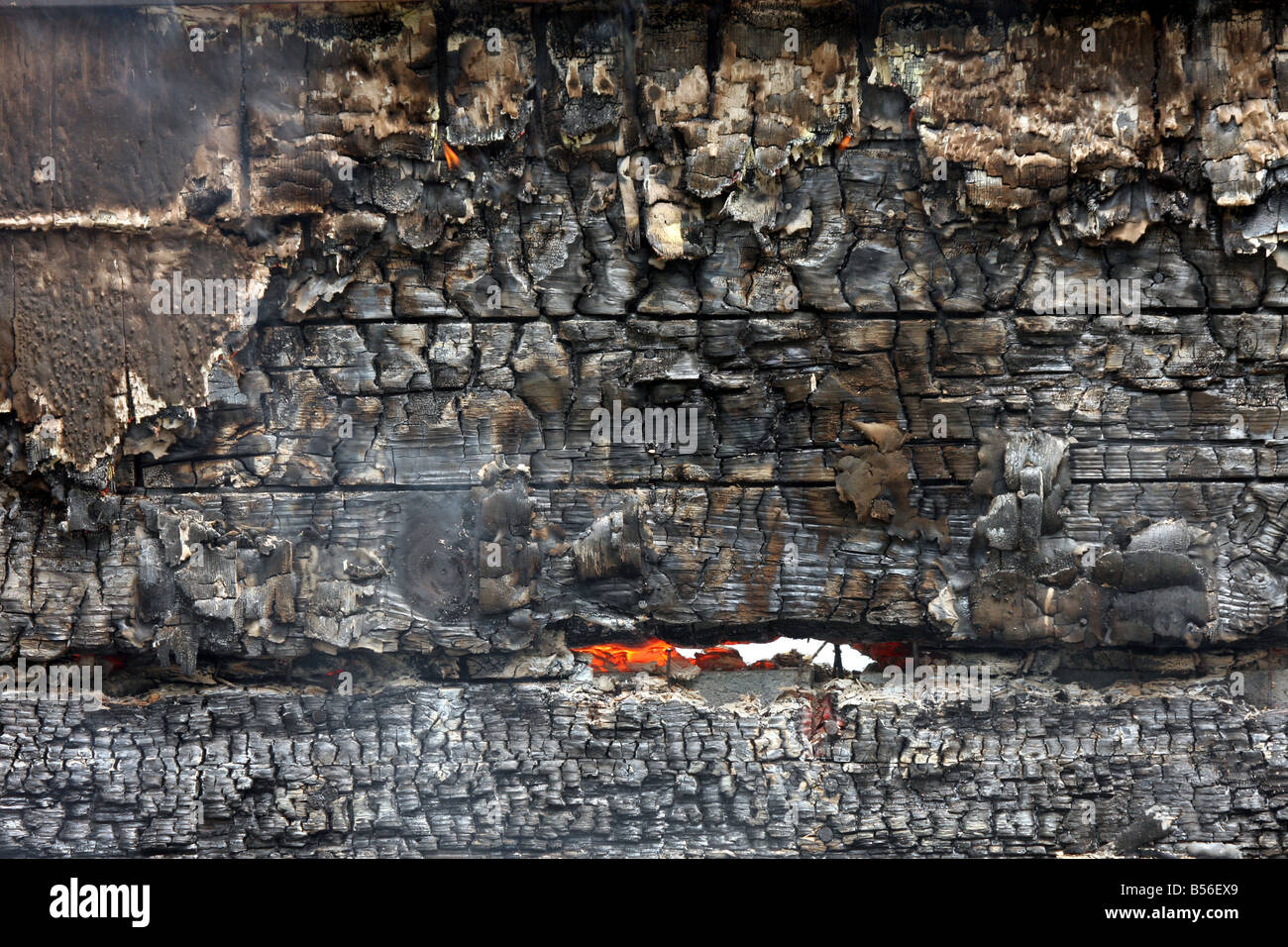 The burnt exterior wall of a house that had a fire Stock Photo - Alamy