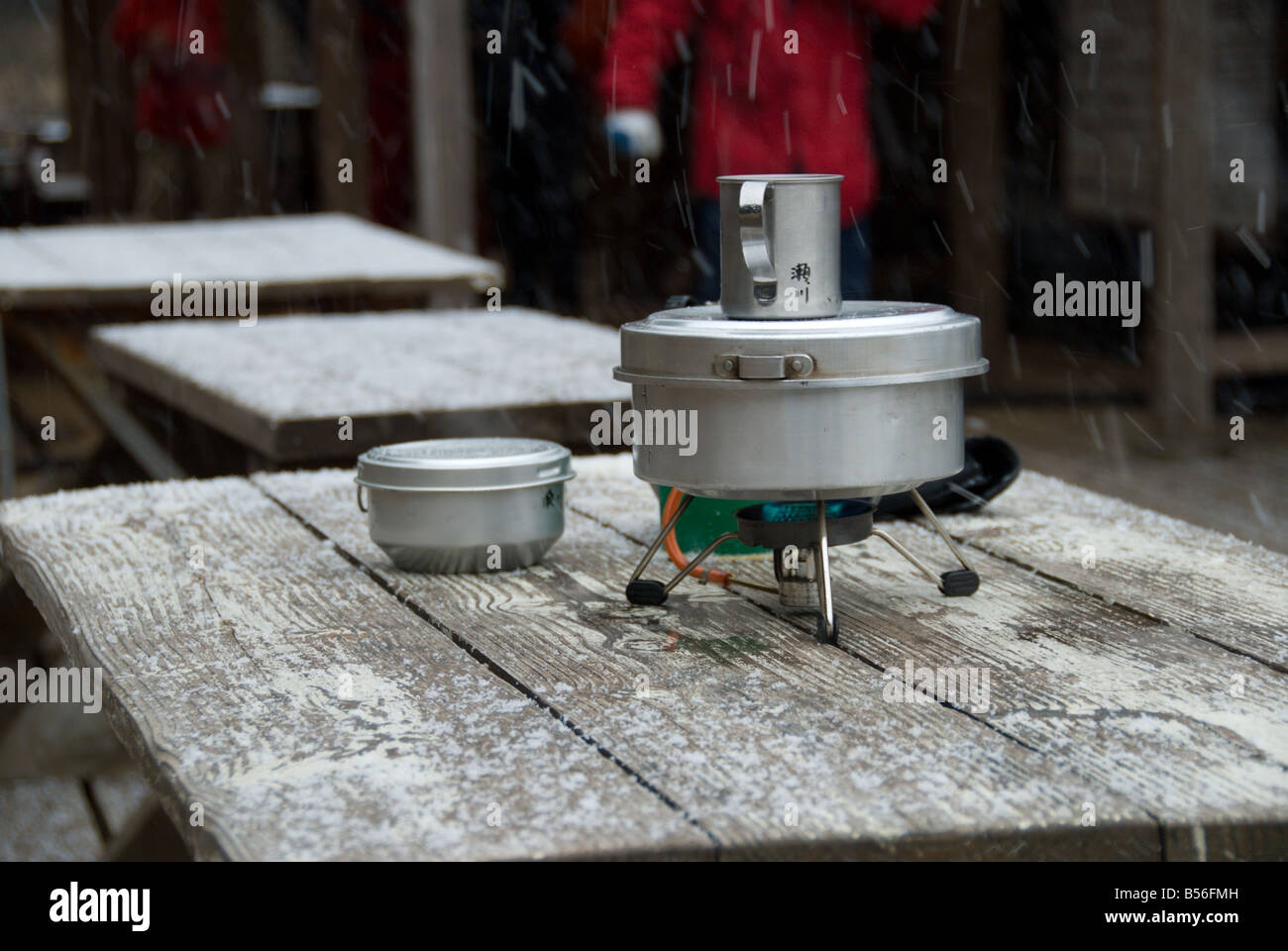 Camp Cooking, Snowfall Stock Photo - Alamy