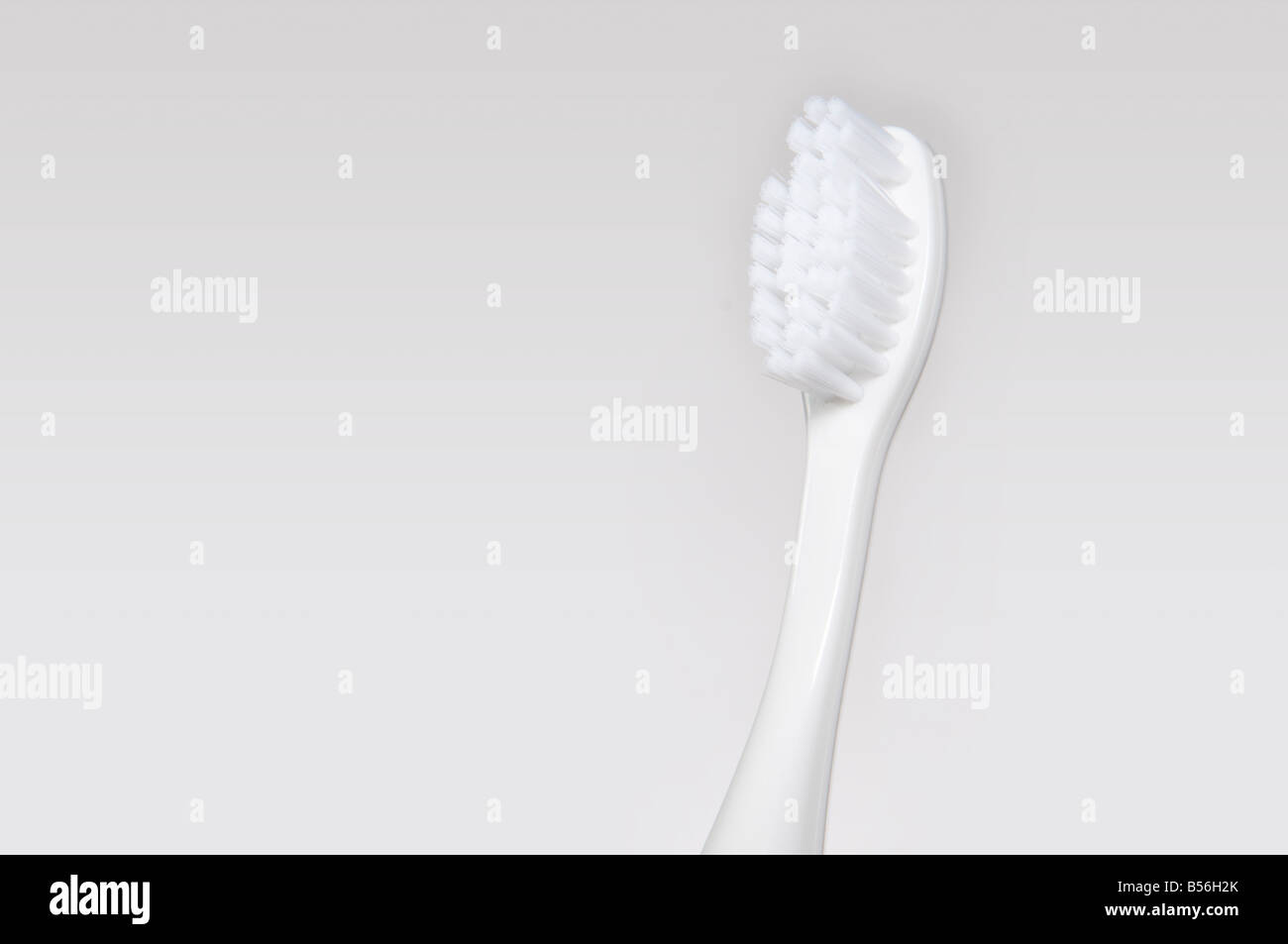 White Toothbrush On White Background Stock Photo - Alamy