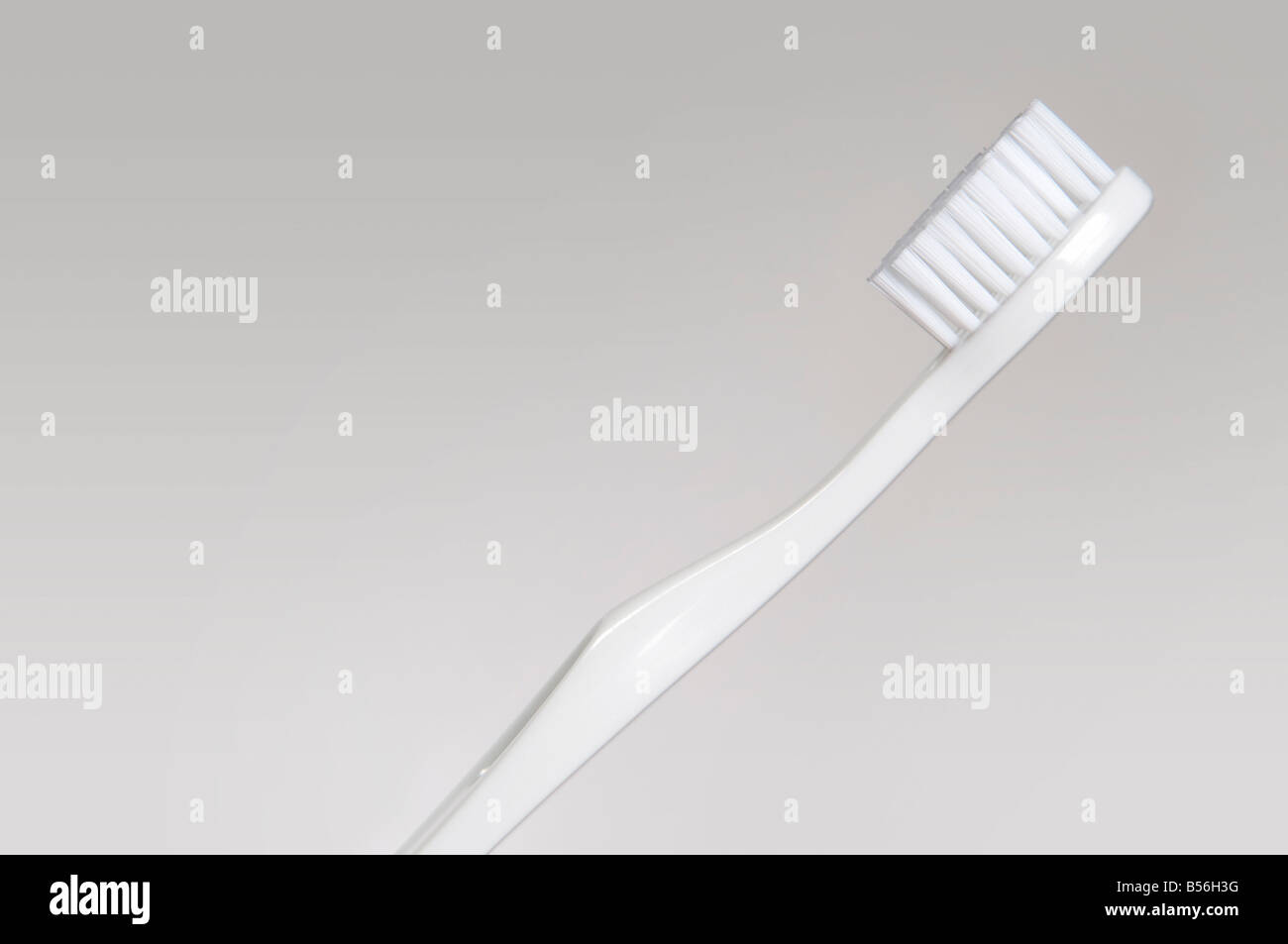 White Toothbrush On White Background Stock Photo - Alamy