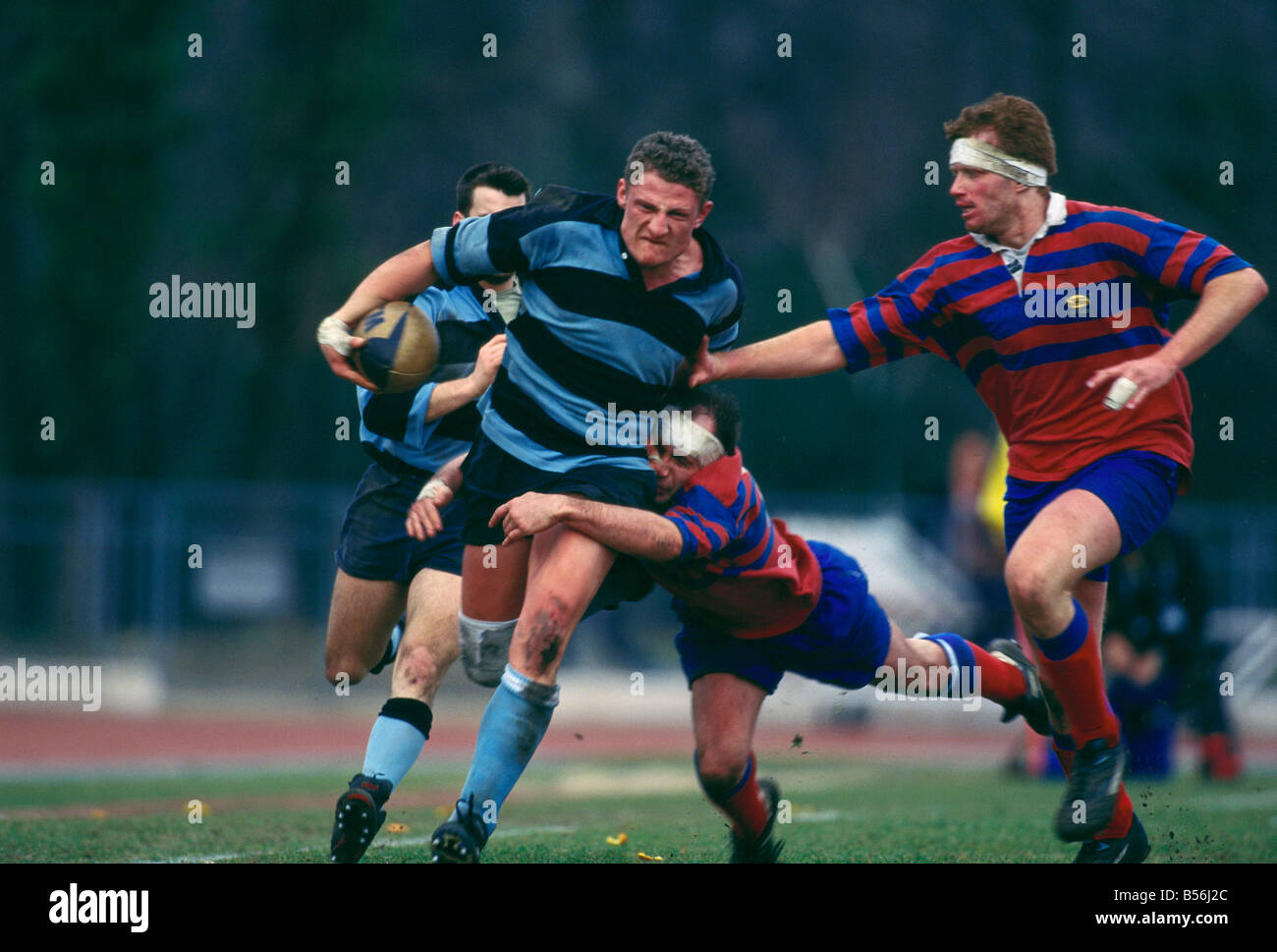 Male rugby game action Stock Photo - Alamy