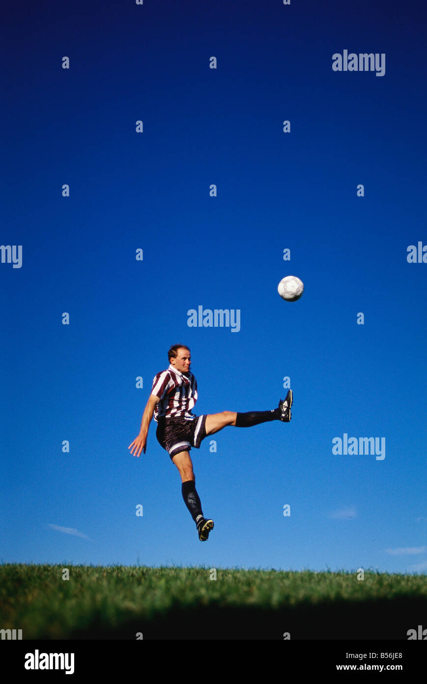 Football Player Kicking Ball High Resolution Stock Photography and ...