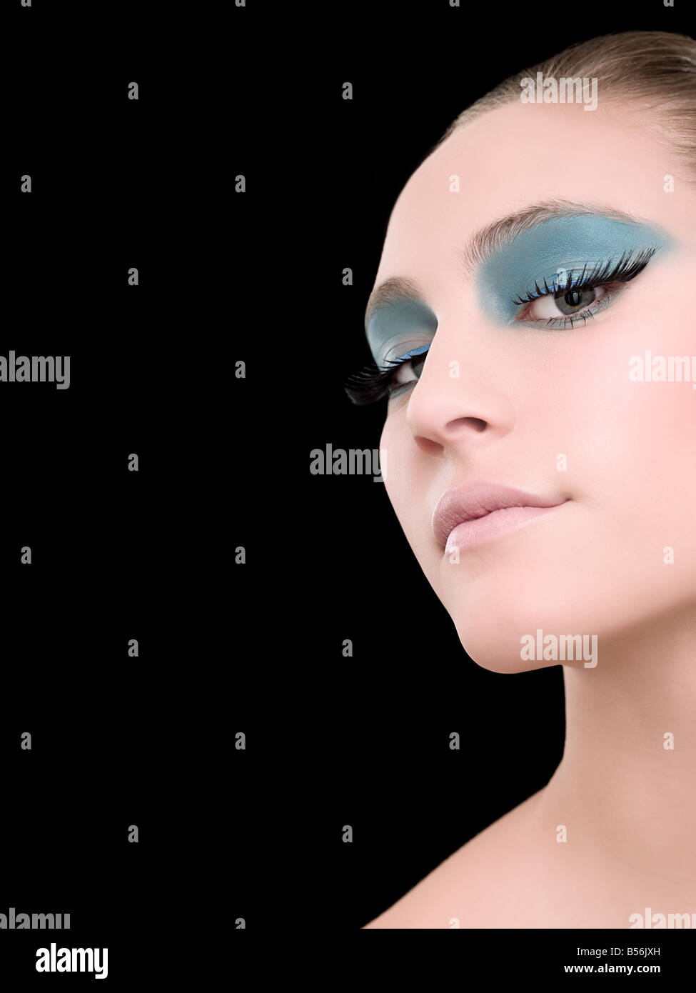 Portrait of a young woman wearing false eyelashes Stock Photo - Alamy