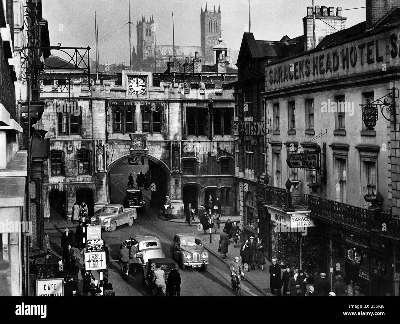 Lincoln. The cathedral built on a hill towers over the High Street ...