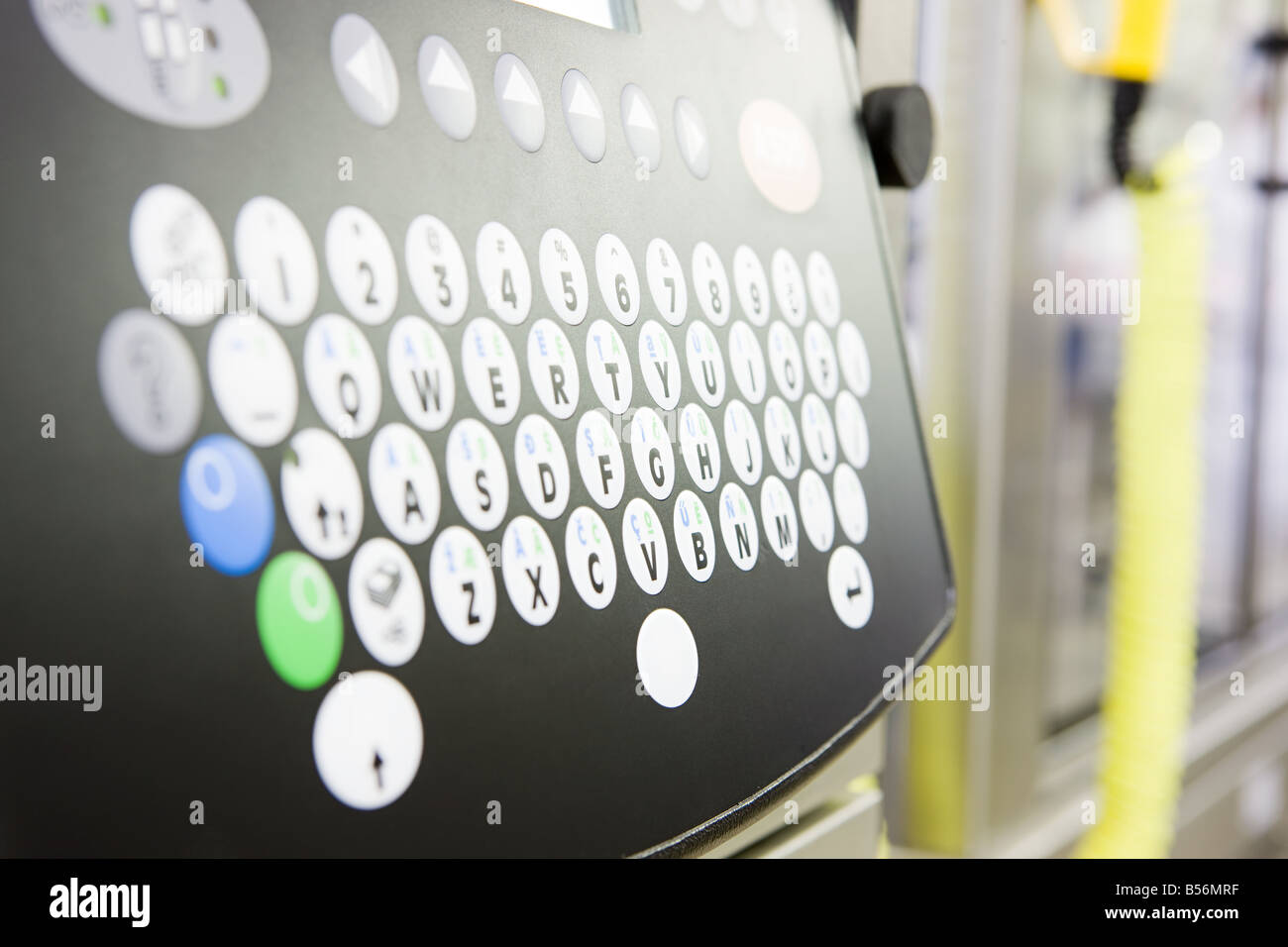 Computer keypad on a machine Stock Photo - Alamy