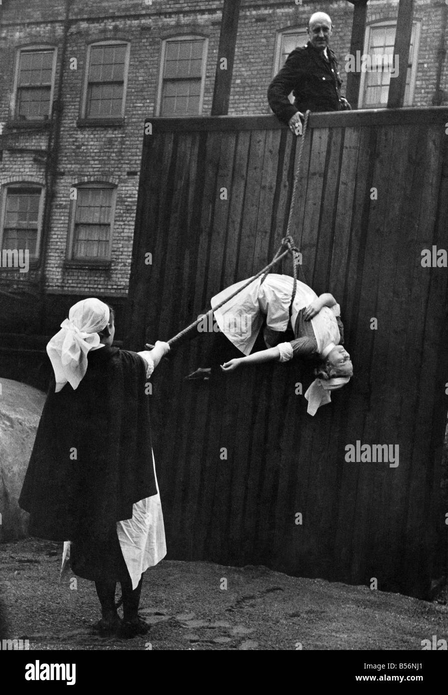 Under the direction Black and White Stock Photos & Images - Alamy