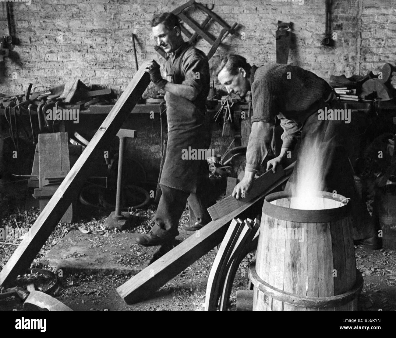 Busy making casks for navy. Naval ships have many uses for casks and ...