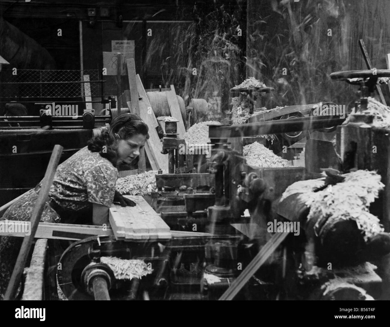 Girls in saw mills now doing work of men. July 1941 P010280 Stock Photo ...