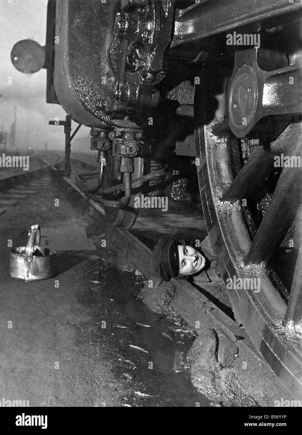 World War II Women. Woman engine cleaner at work at Kings Cross Loco ...