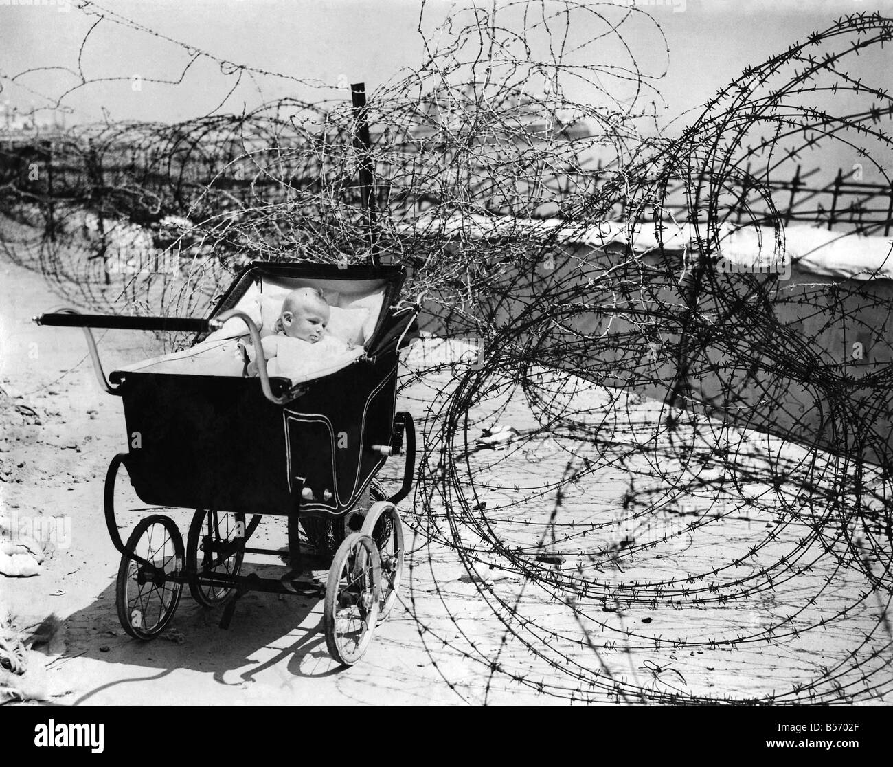 World War II: Home front. This baby enjoys the sea air as best she can ...