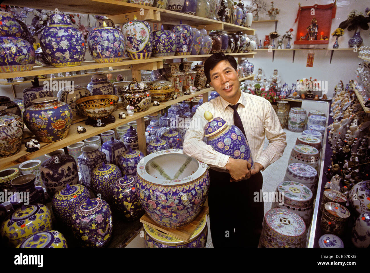 Chinese store owner Stock Photo - Alamy