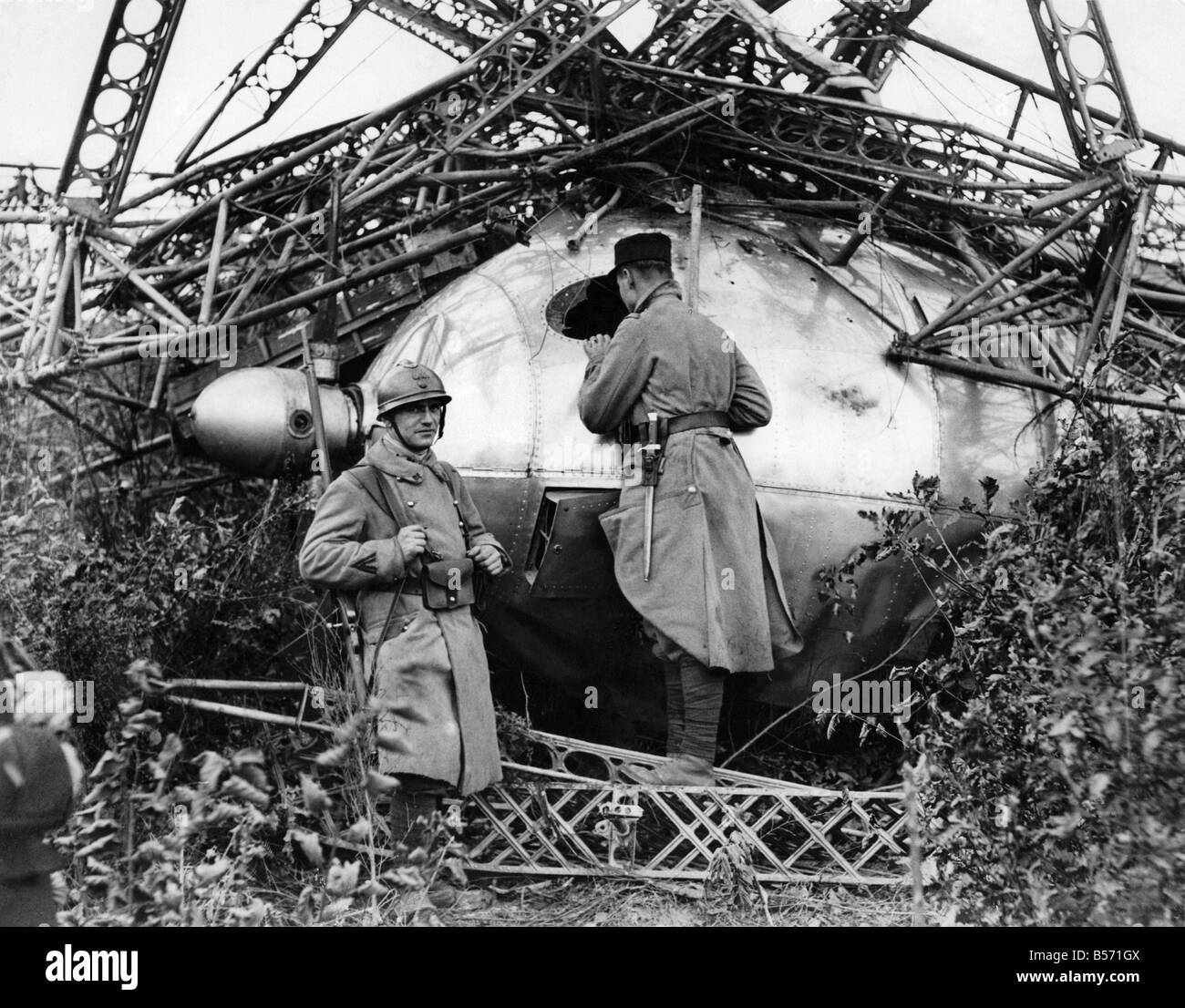 French soldiers at the scene of the crash of the British airship R101 ...